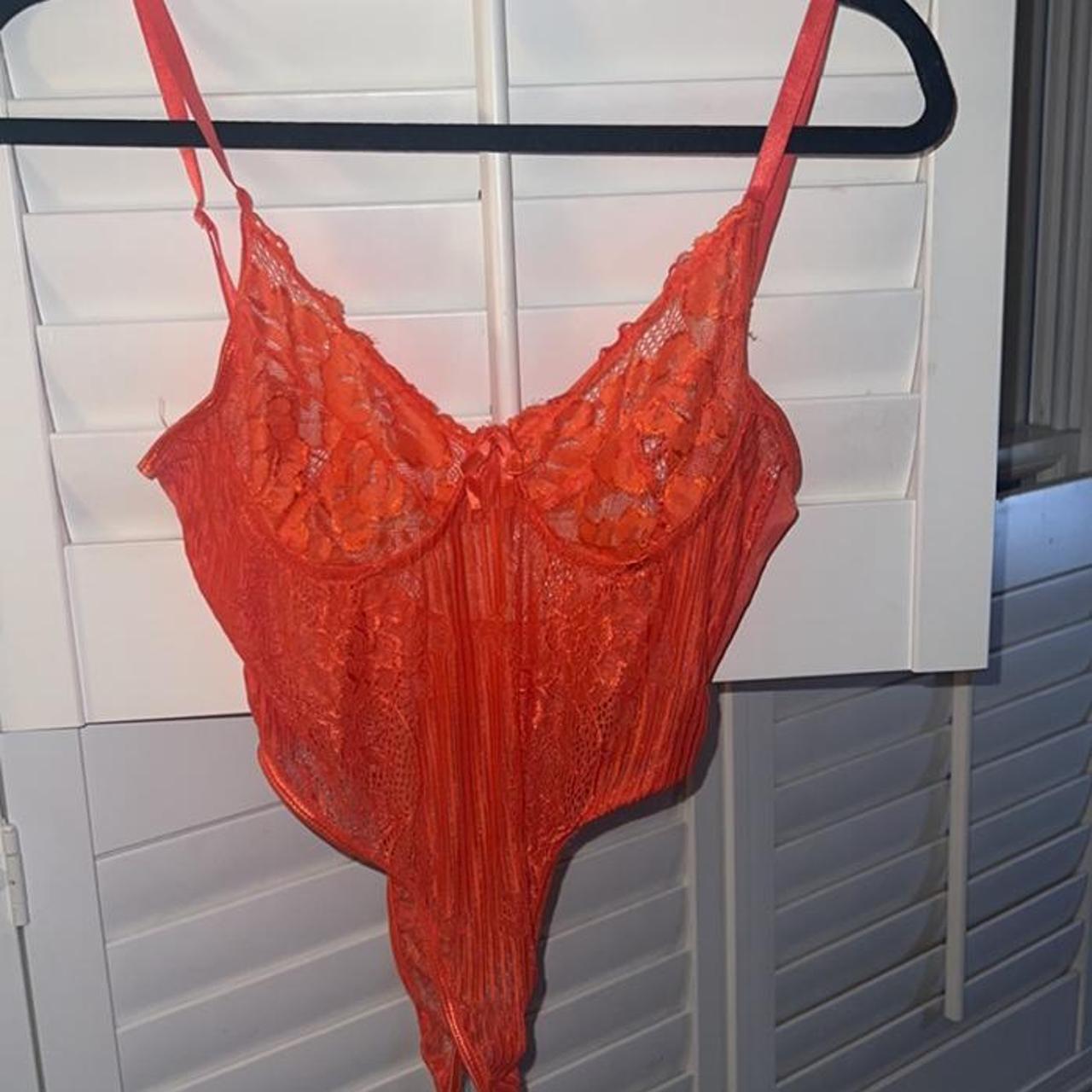 Orange lace thong bodysuit so flattering never worn - Depop