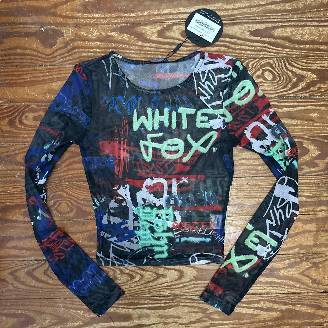See through graphic White Fox long sleeve crop top.... - Depop