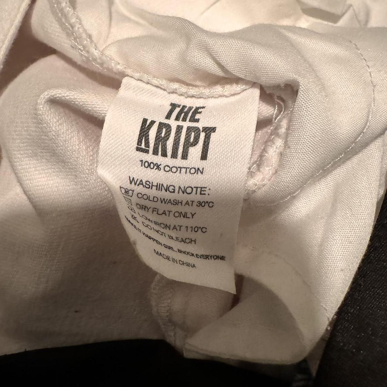 Black and white split pants from the Kript, size small - Depop