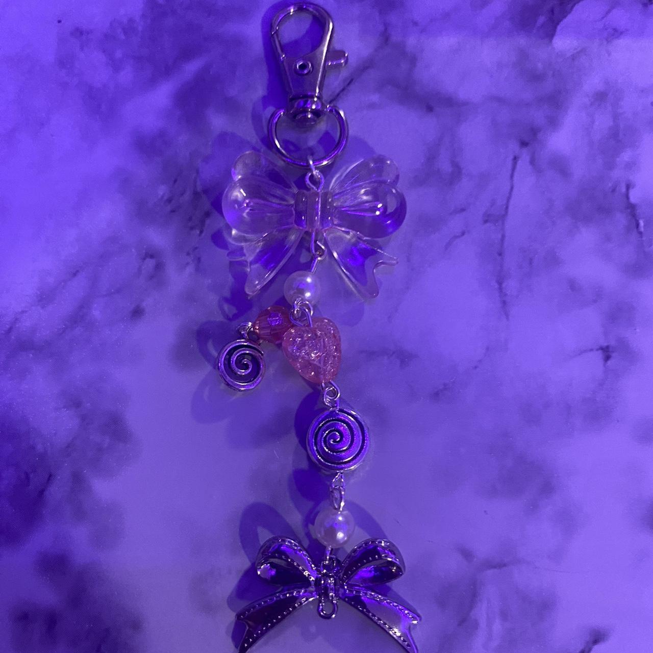 pink and silver handmade keychain with a bow charm,... - Depop