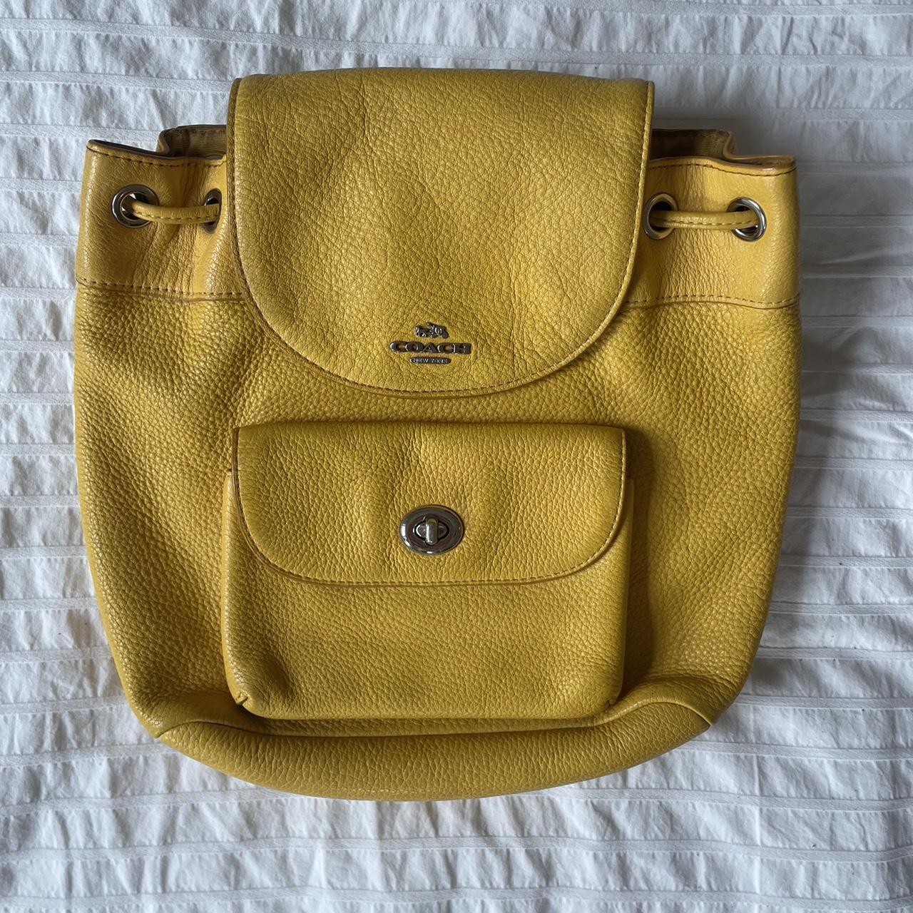 Yellow Leather Coach Mini Backpack. Couple of light... - Depop