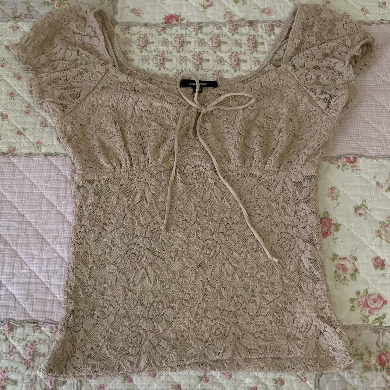 sheer tan lace top with a tie in the front top part... - Depop