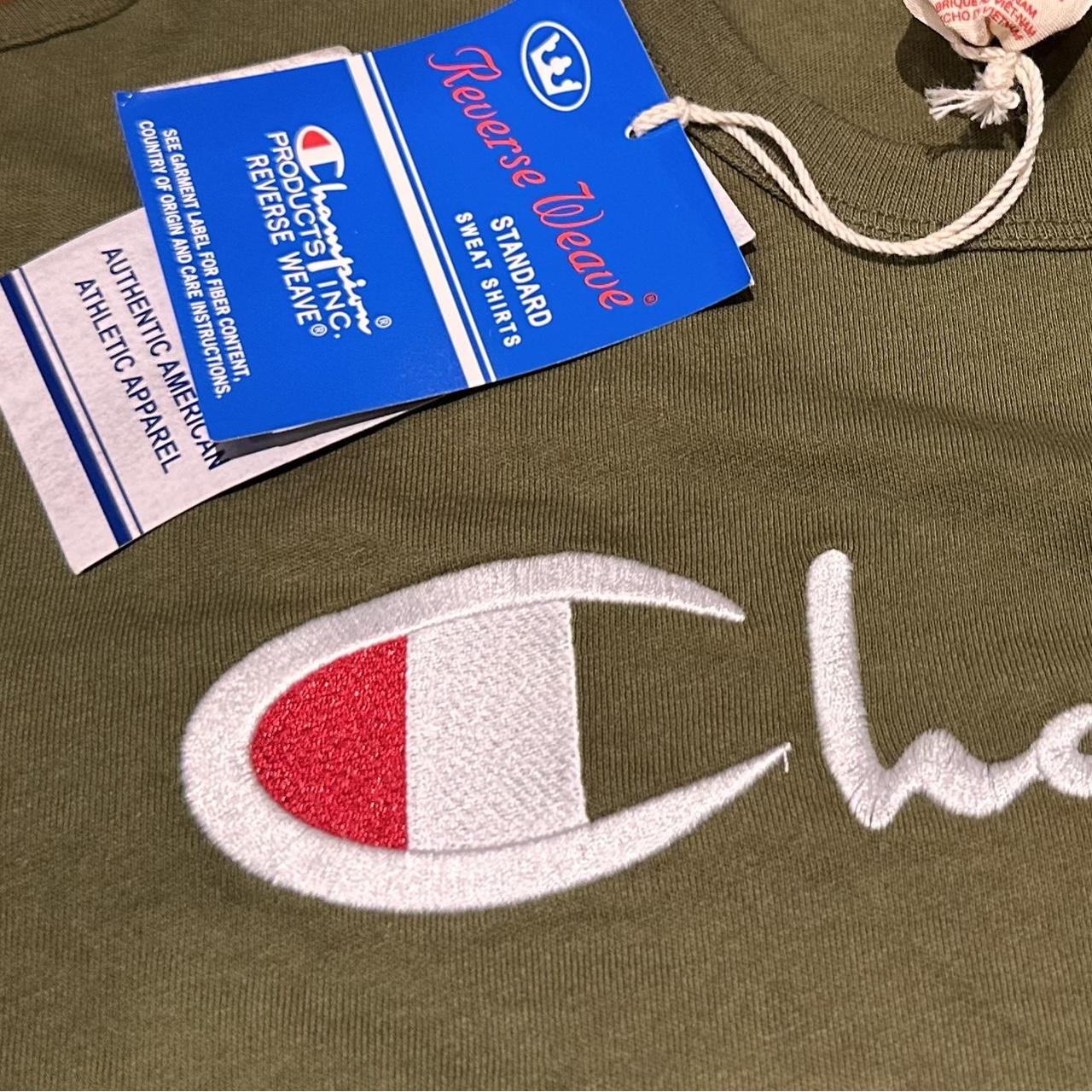 Brand New with tags embroidered green champion logo... - Depop