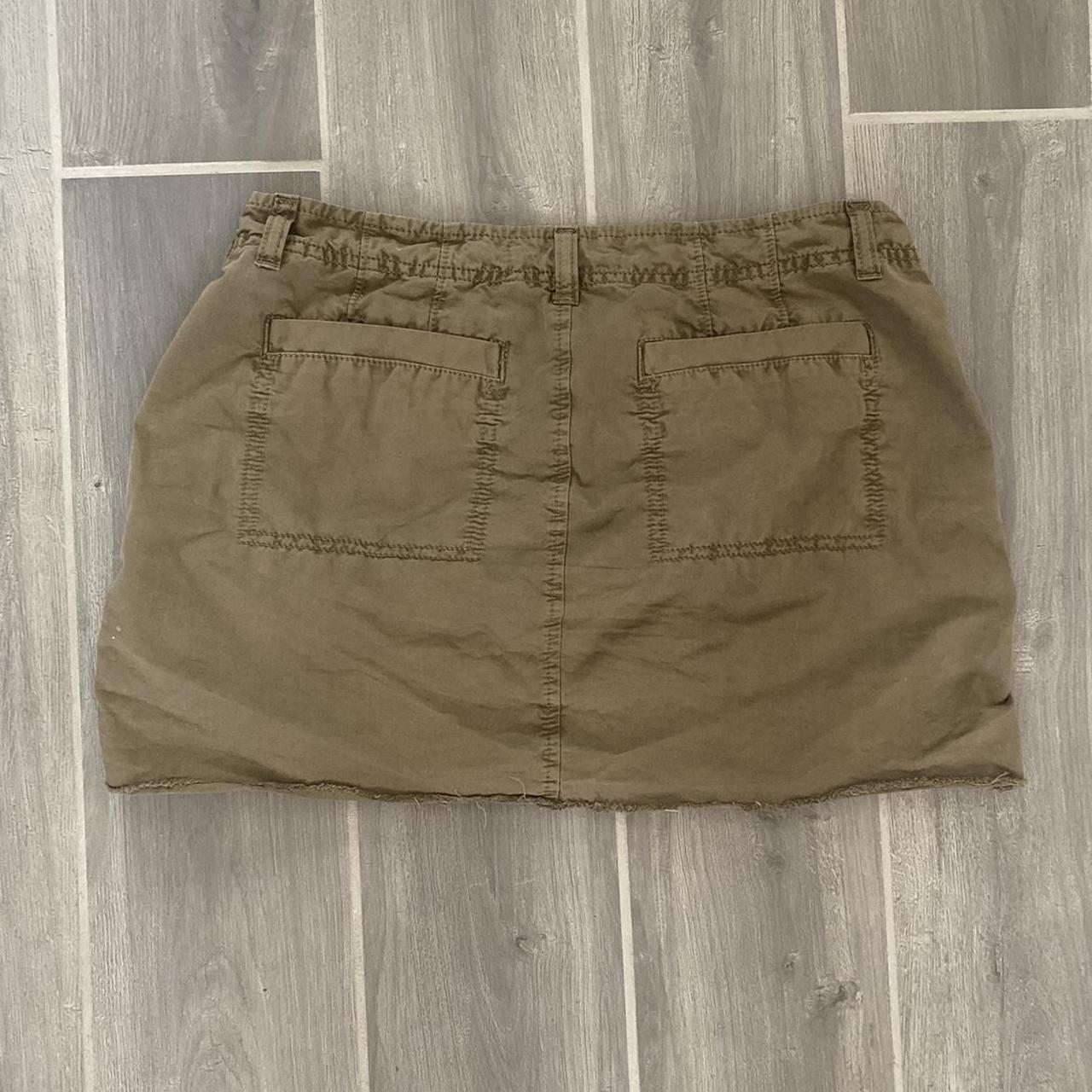 old navy green cargo/utility mini skirt. has a raw... - Depop