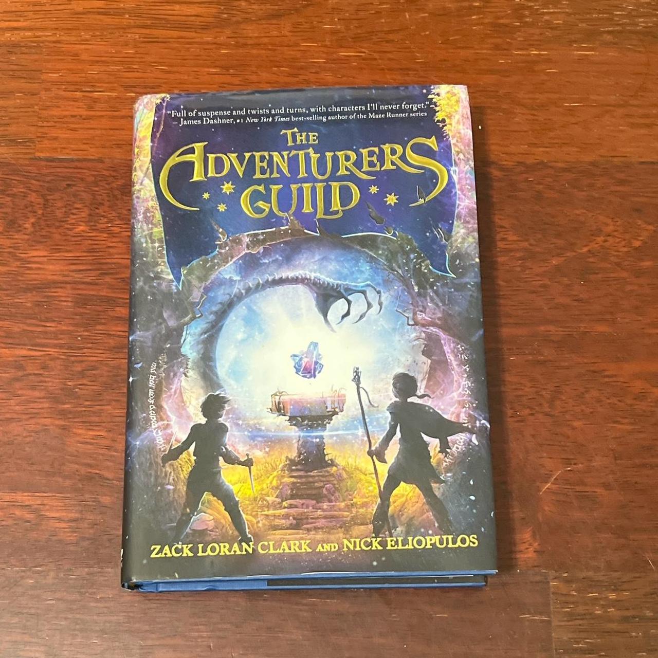 HARDCOVER The Adventurers Guild by Zack Loran Clark... - Depop