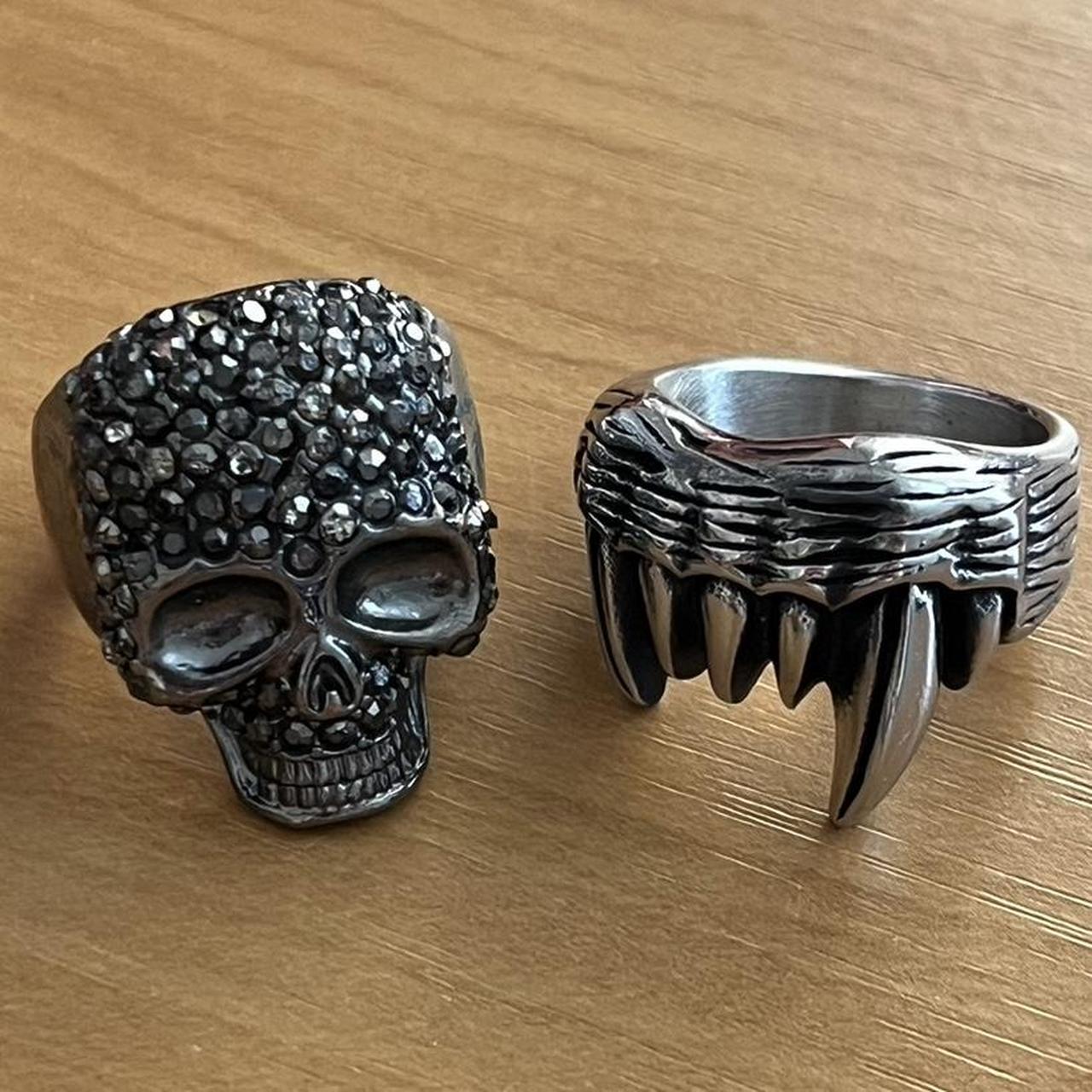 Skull ring and Fangs ring ^_^ The skull ring is... | Depop
