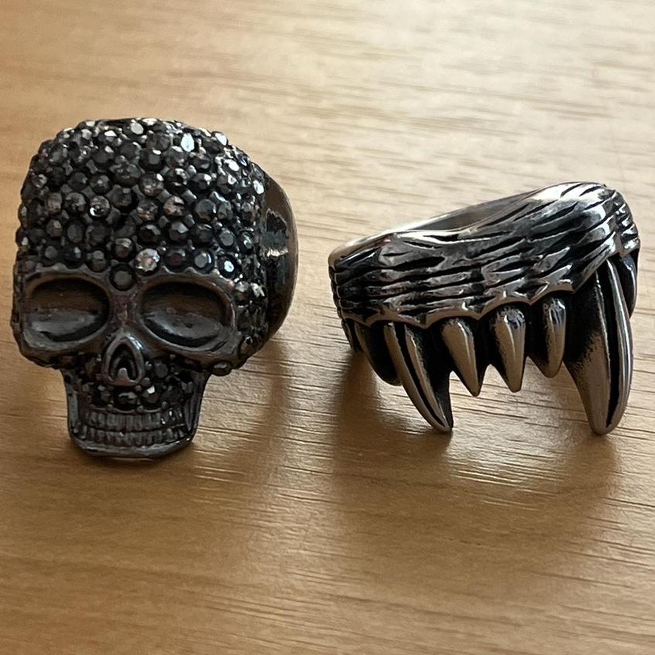 Skull ring and Fangs ring ^_^ The skull ring is... | Depop