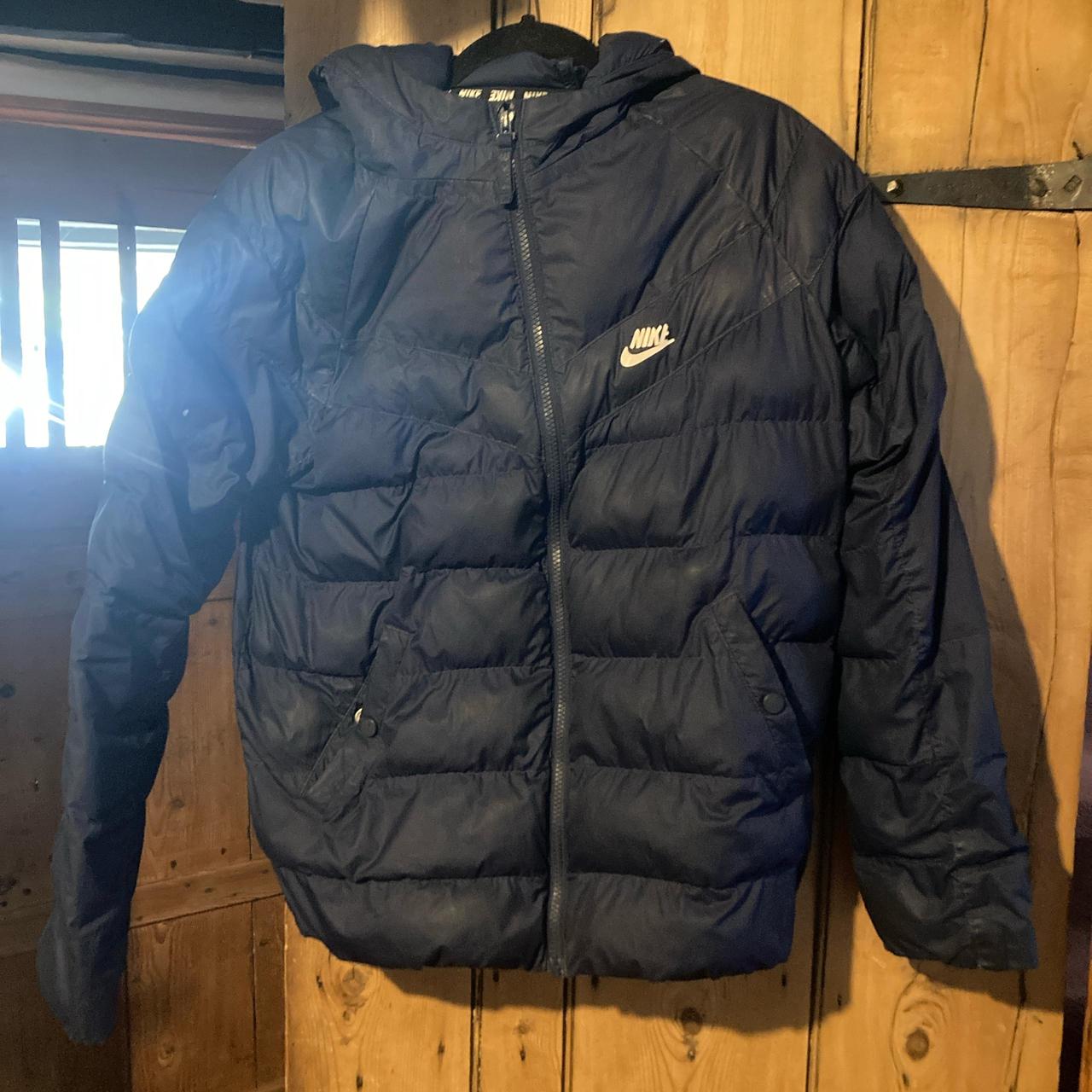 navy blue nike puffer coat. size kids XL. decent... - Depop