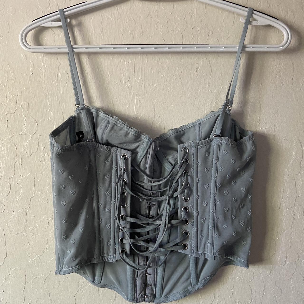 - urban outfitters light blue corset top - size medium - Depop
