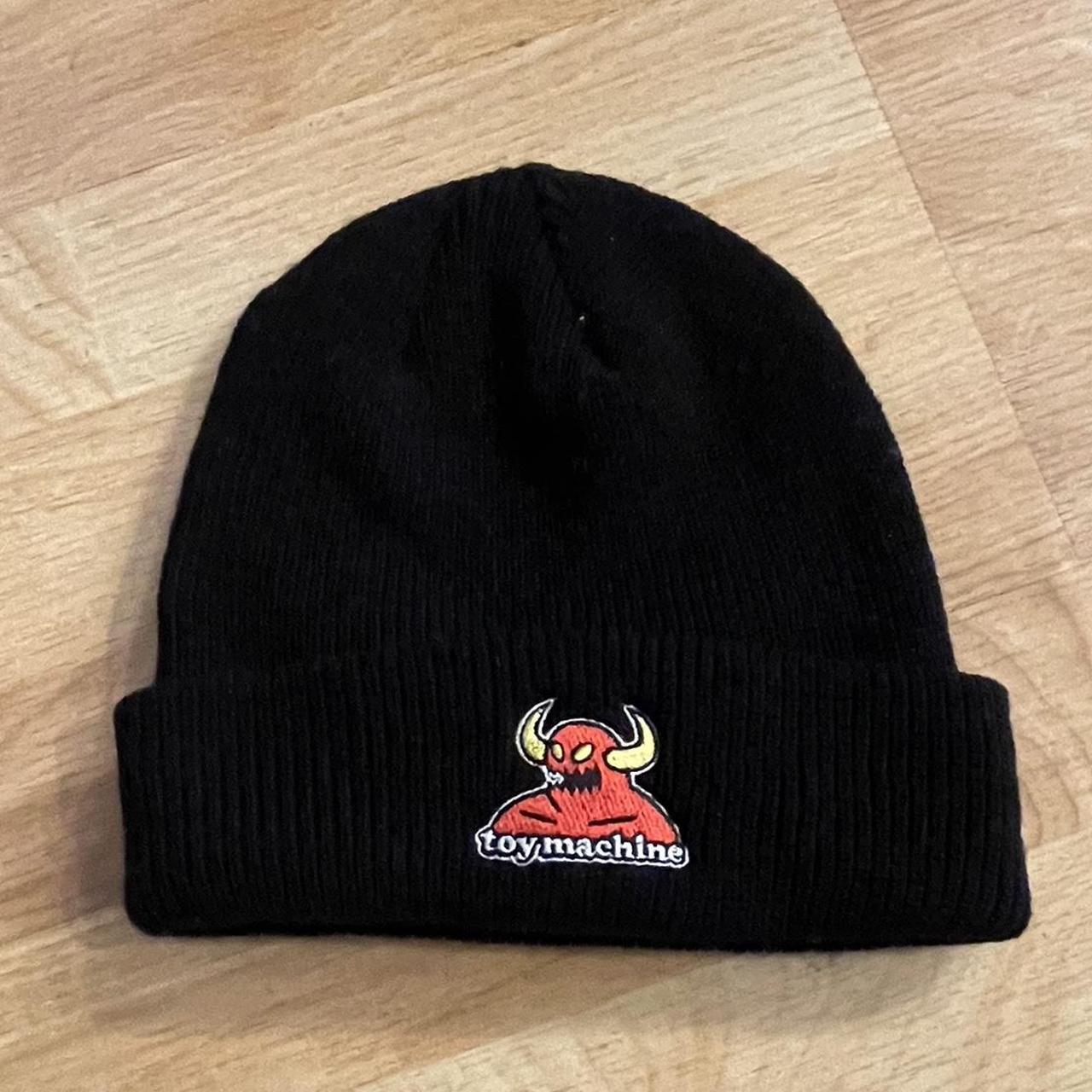 black toy machine beanie - Depop