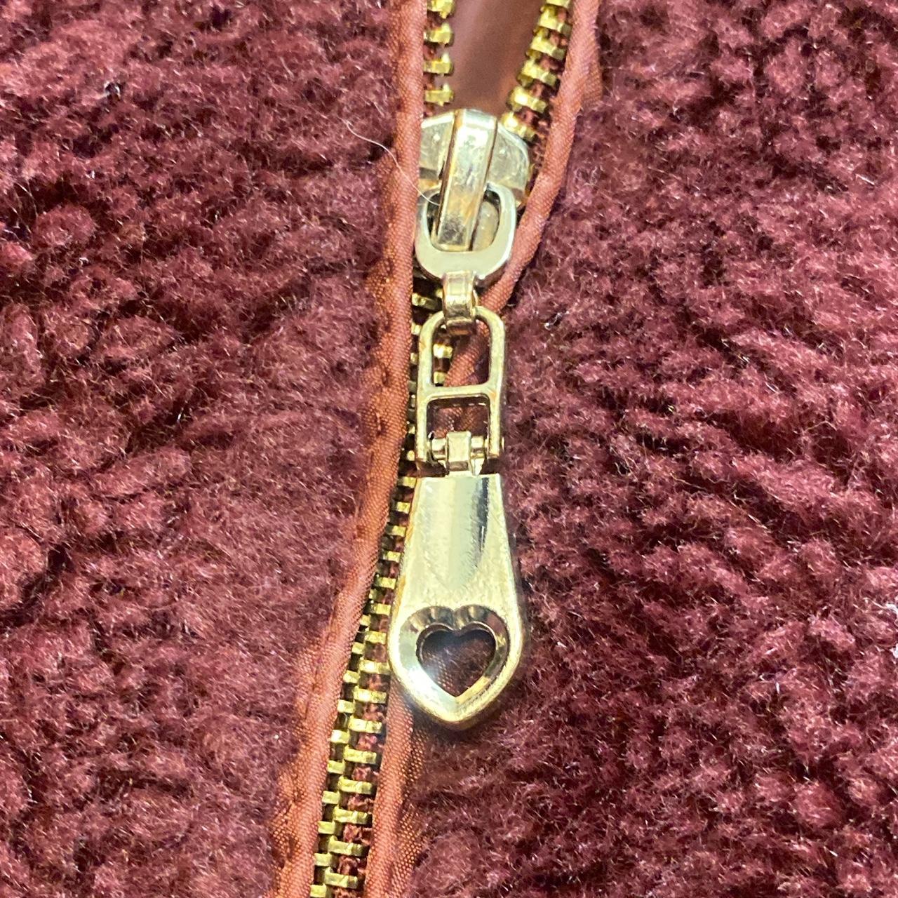 Red furry jacket with golden zipper #jacket... - Depop