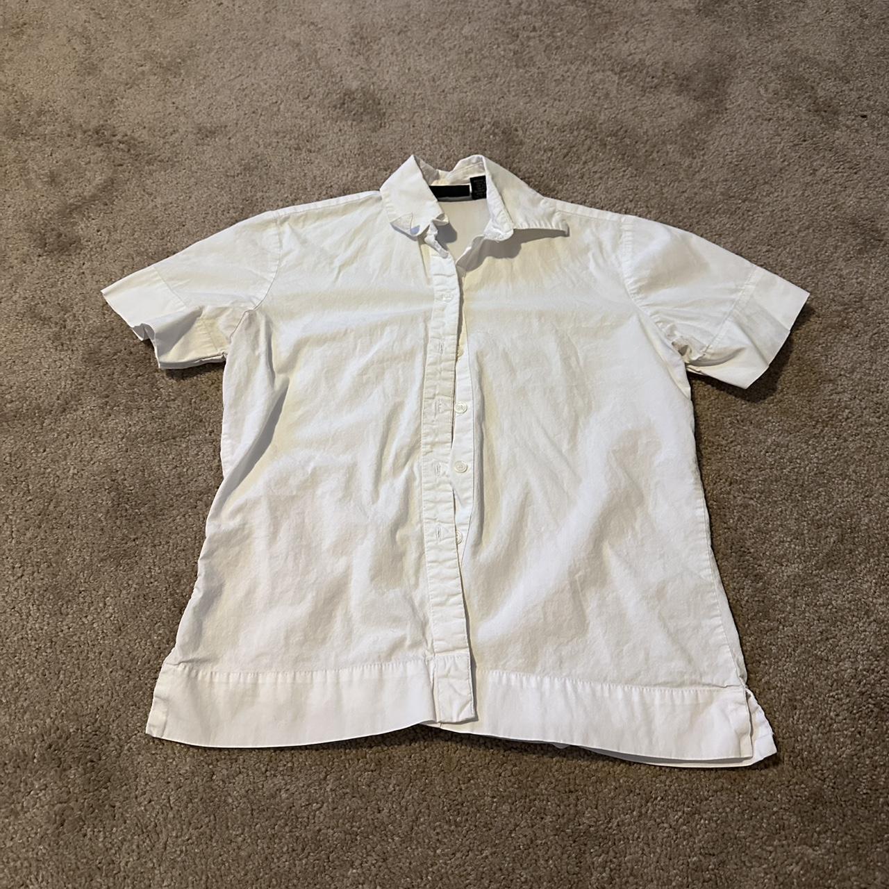 White button-up shirt with a relaxed fit, great for... | Depop