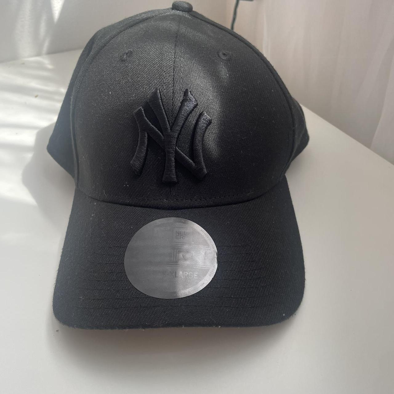 All black ny yankees hat. In great condition and... - Depop