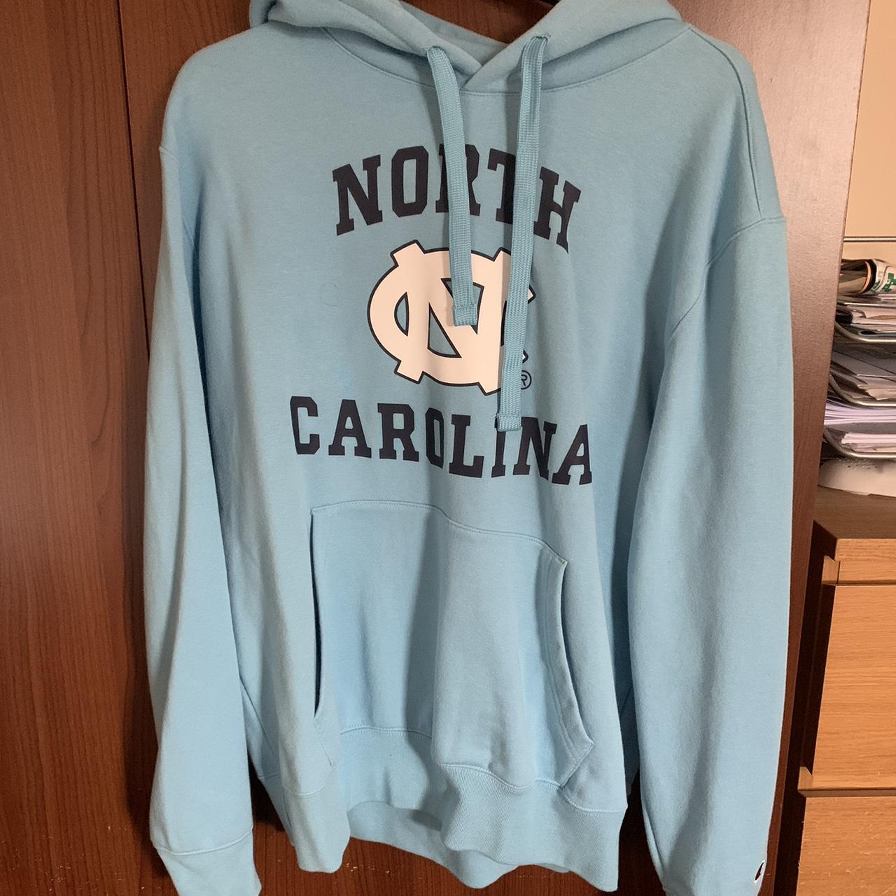 light blue champion north carolina hoodie size... - Depop
