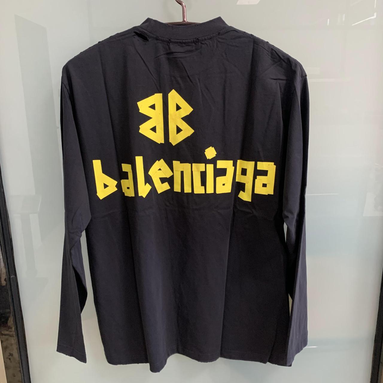 Balenciaga ripped black long sleeve T-shirt Brand... - Depop