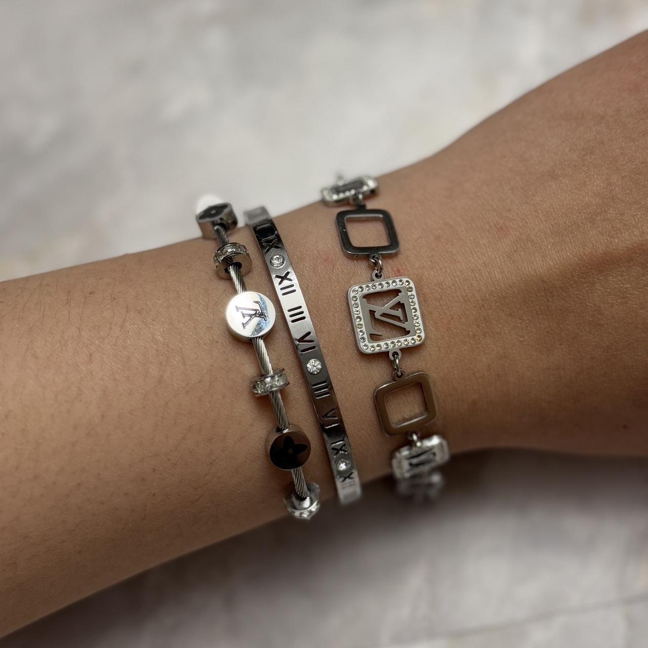 Silver bangles and bracelet with rhinestones... - Depop