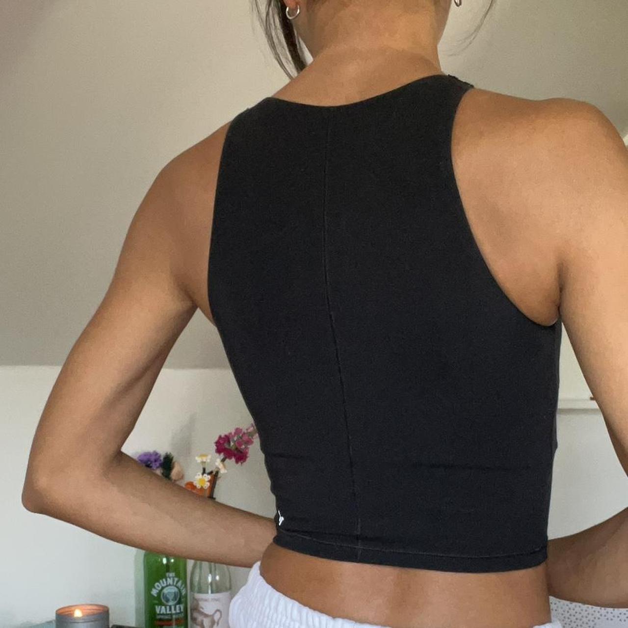 Black high neck workout top with built in bra from... - Depop