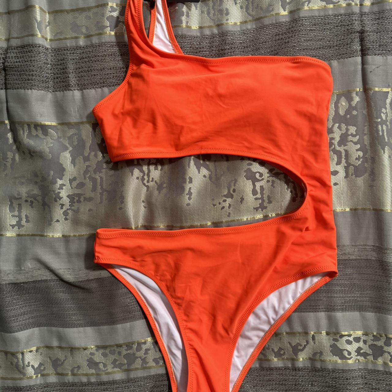 Brand new orange bathing suit size small. It has... - Depop