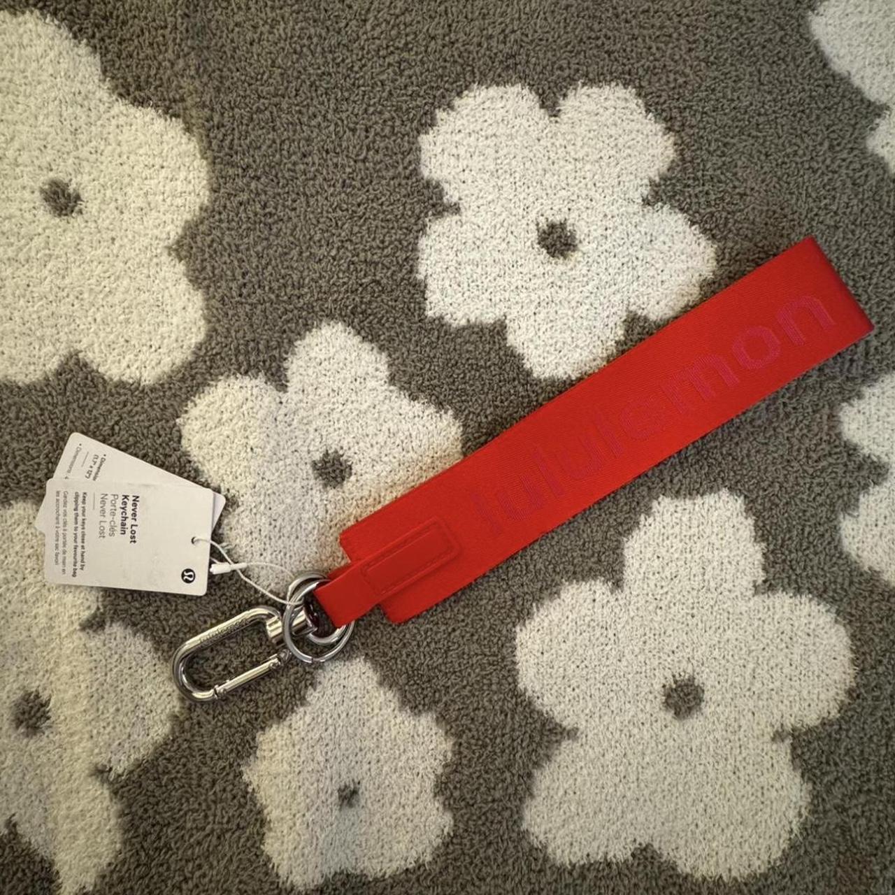 Red lululemon keychain with tag #luluemon #keychain | Depop