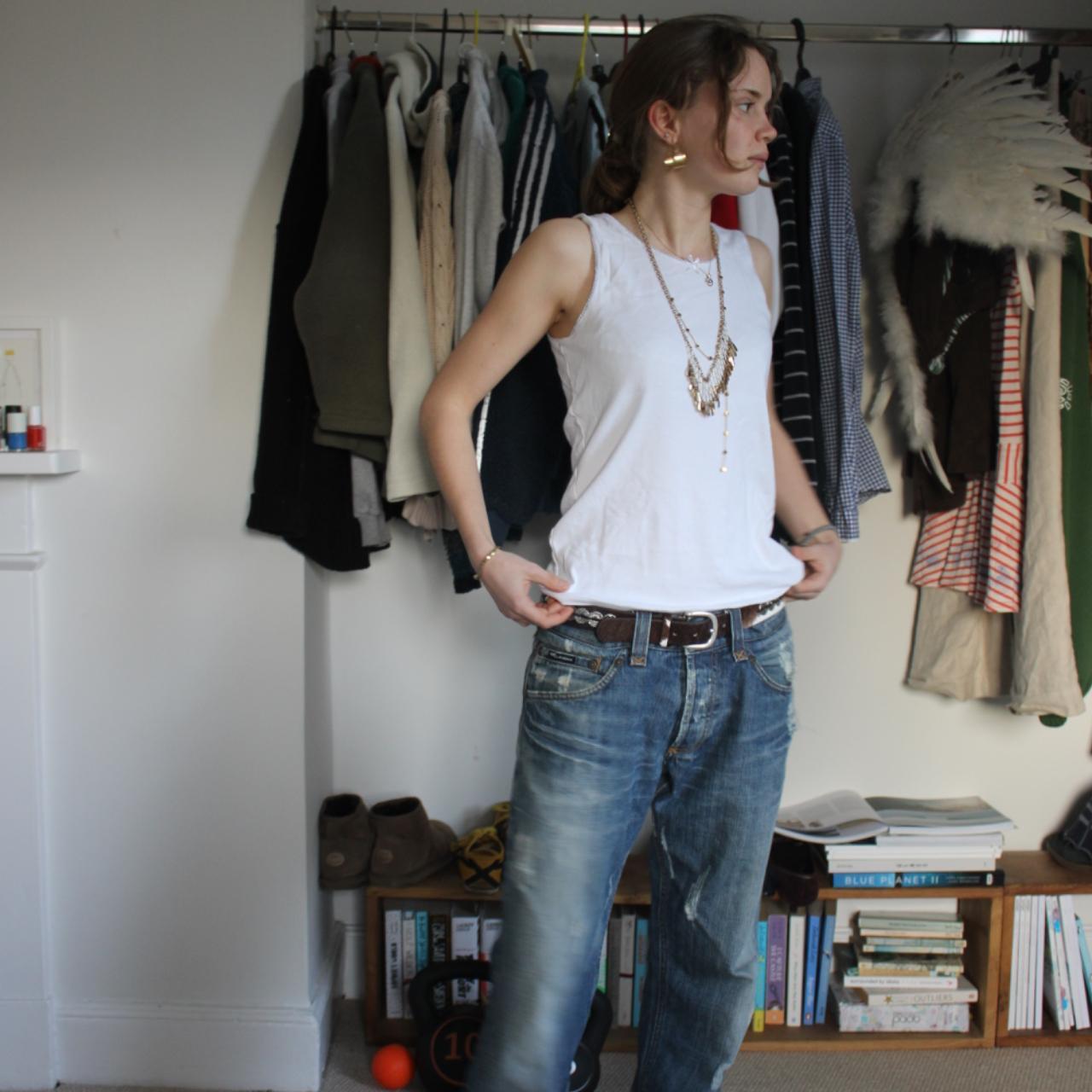 perfect basic white vest with small lace trim around... | Depop