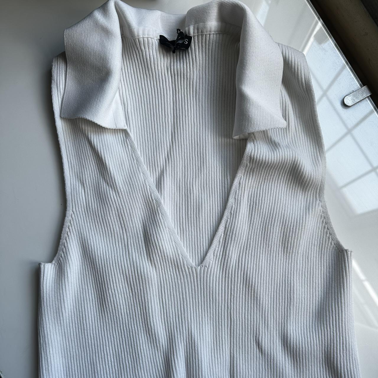 White ribbed vest V neck Cropped, relaxed fit... - Depop
