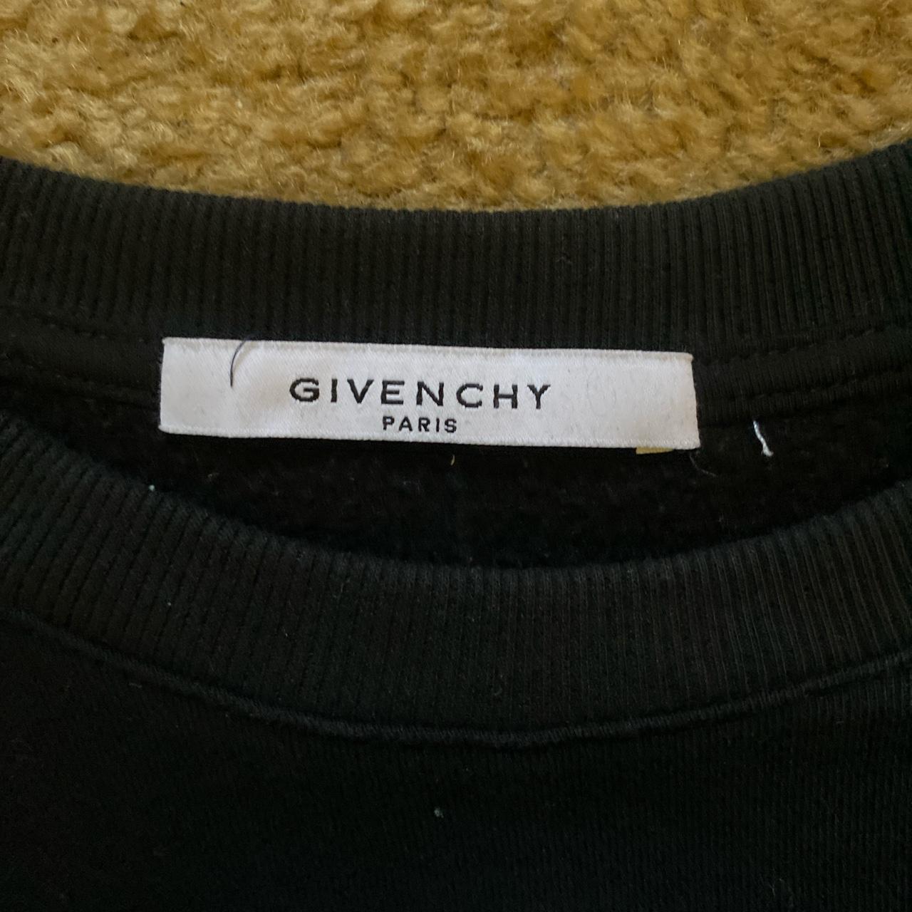 Givenchy religious iconography on a black long... - Depop