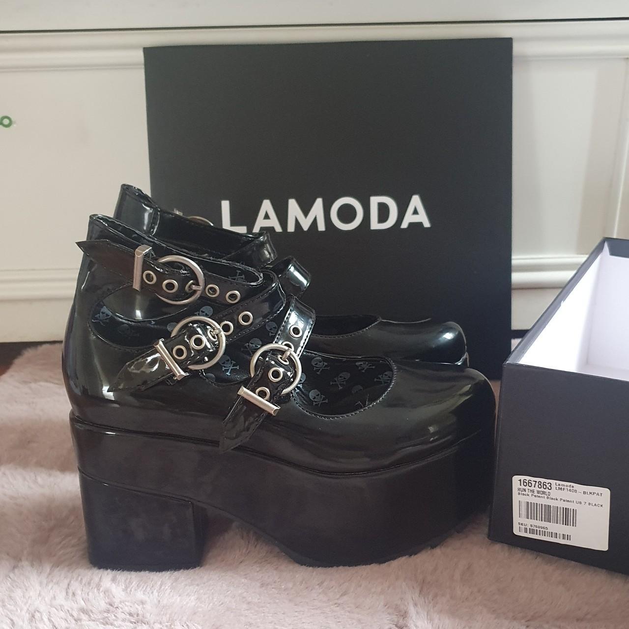 Lamoda - "RUN THE WORLD" black patent dolly shoes... - Depop