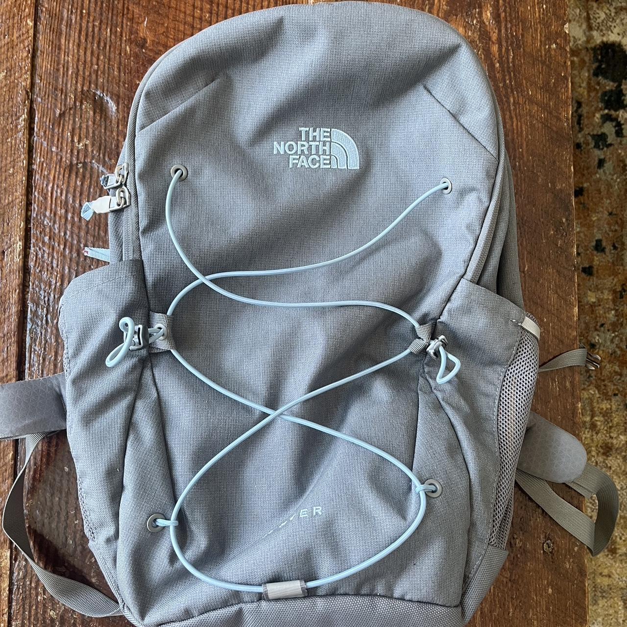 Gray and light blue north face backpack. Great for... - Depop