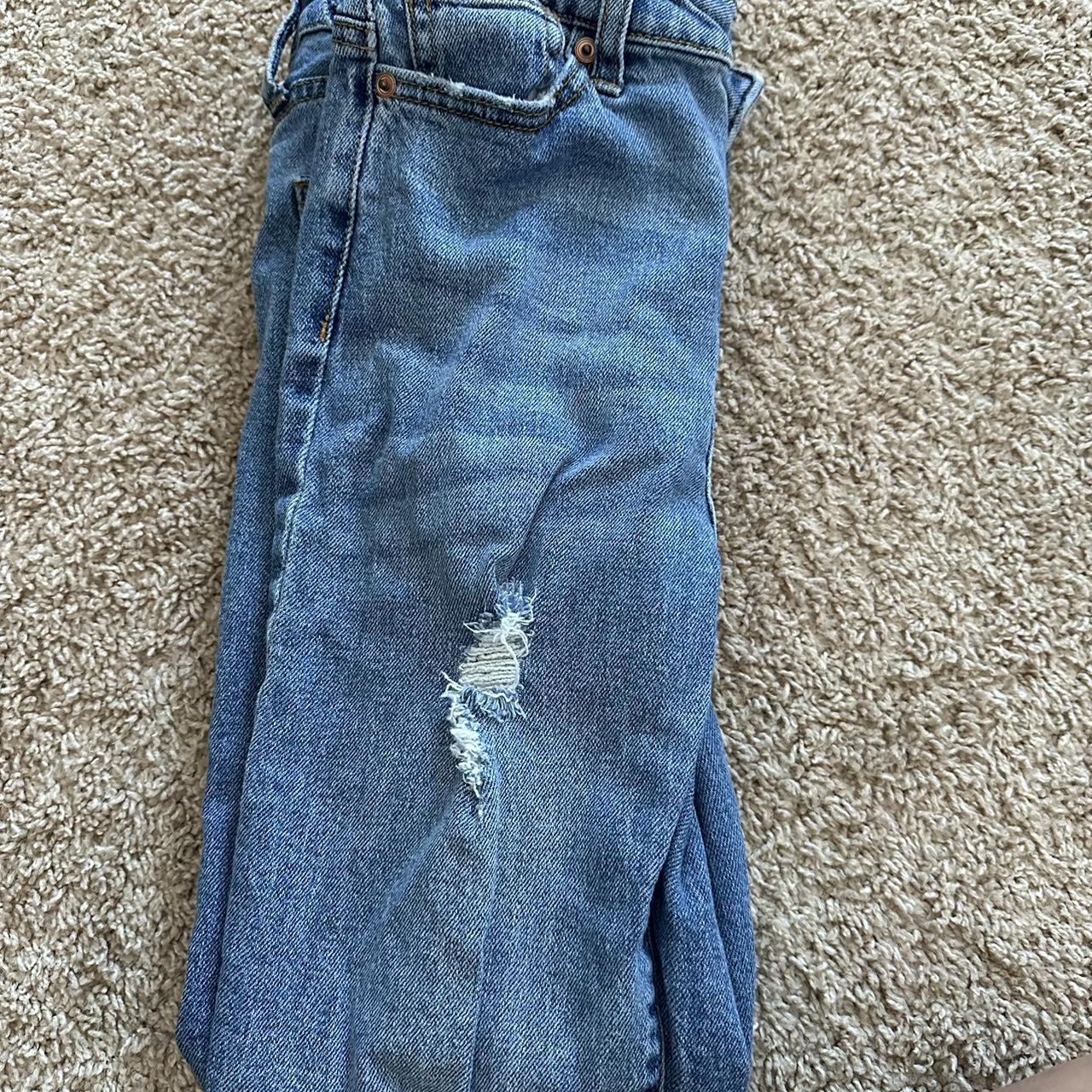 flare denim jeans with small rips, super cute and... - Depop