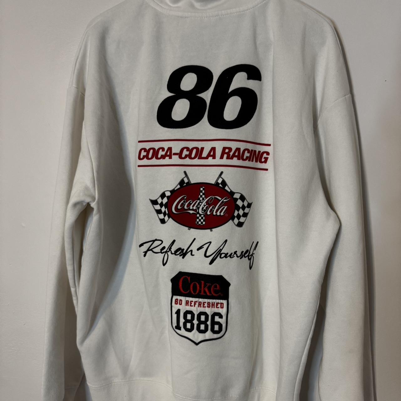 Official Coca-Cola branded quarter zip with a cool... | Depop