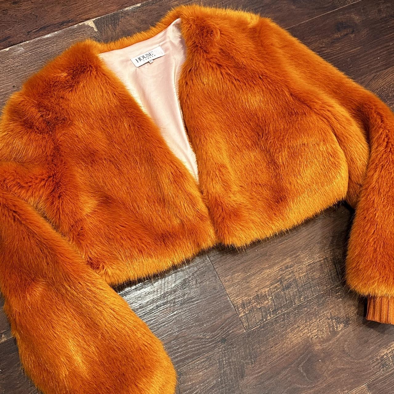 Orange faux fur jacket with a cropped fit and long... - Depop
