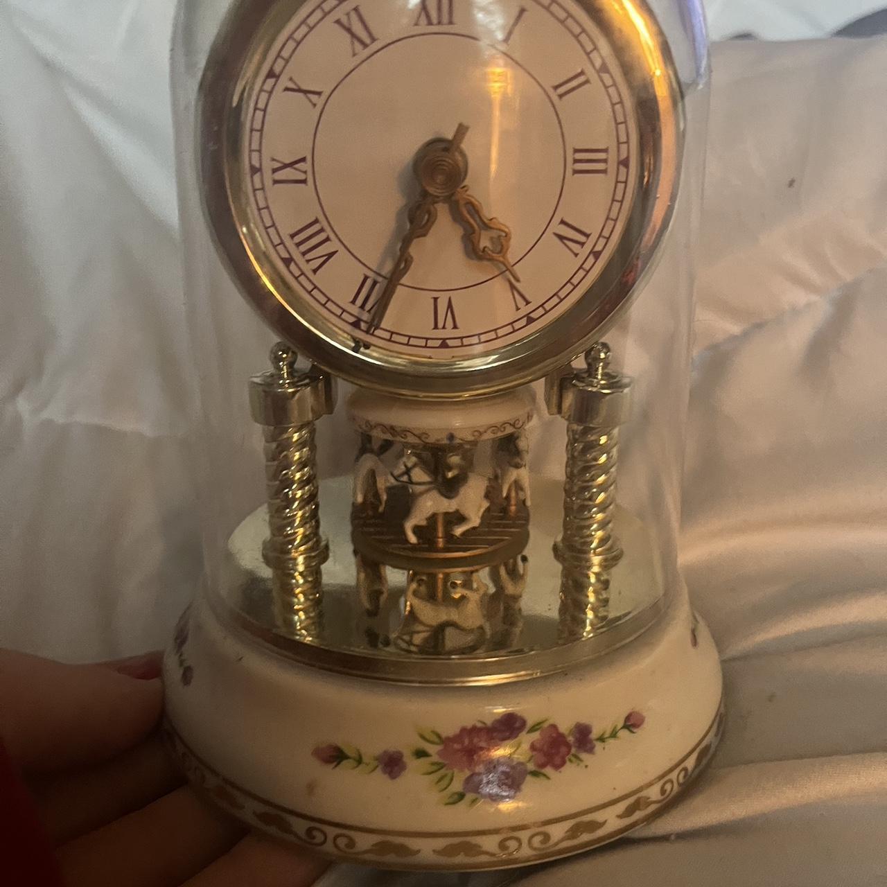 Carousel clock Battery operated spins!! - Depop