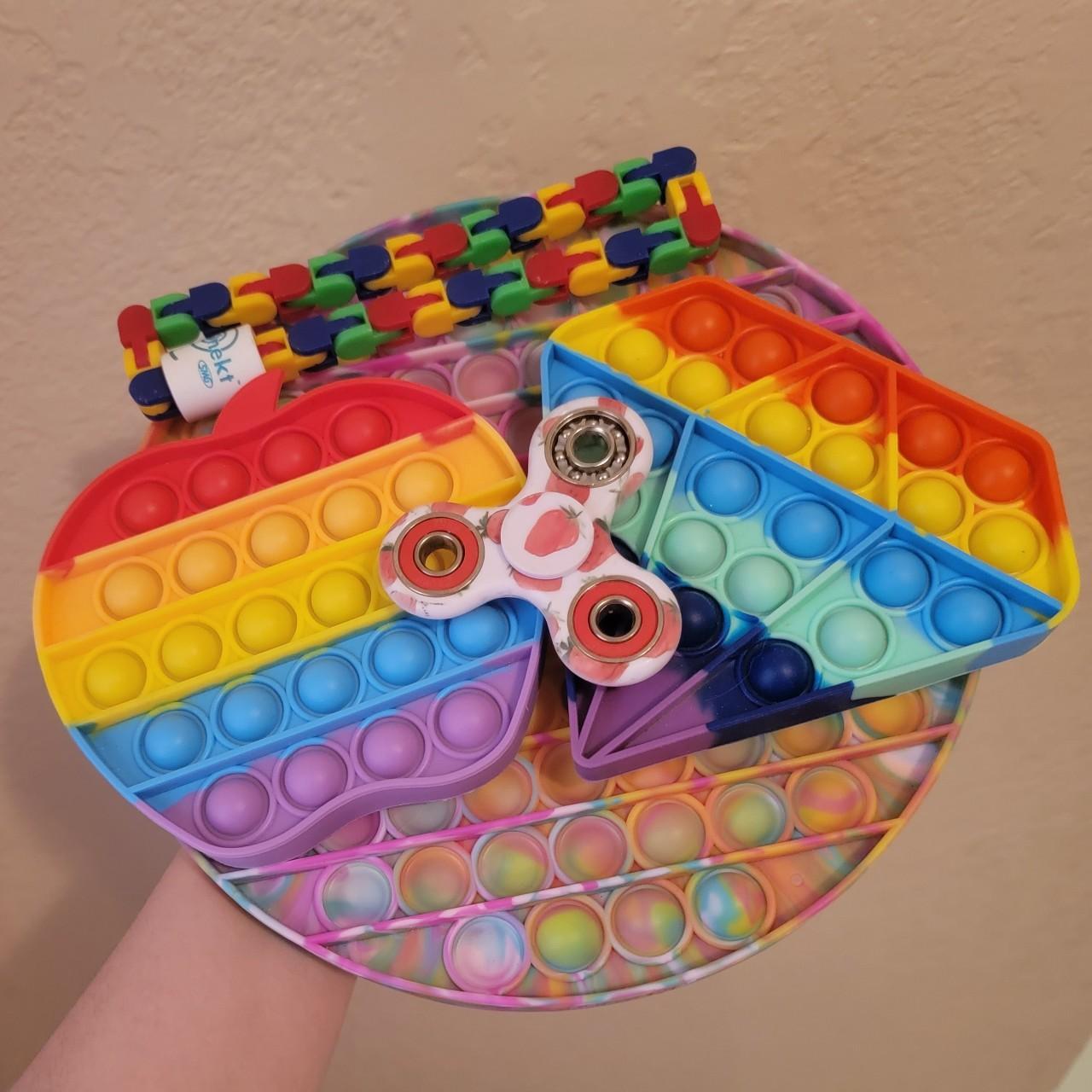 Fidget toy bundle bundle of fidget toys! includes a... - Depop