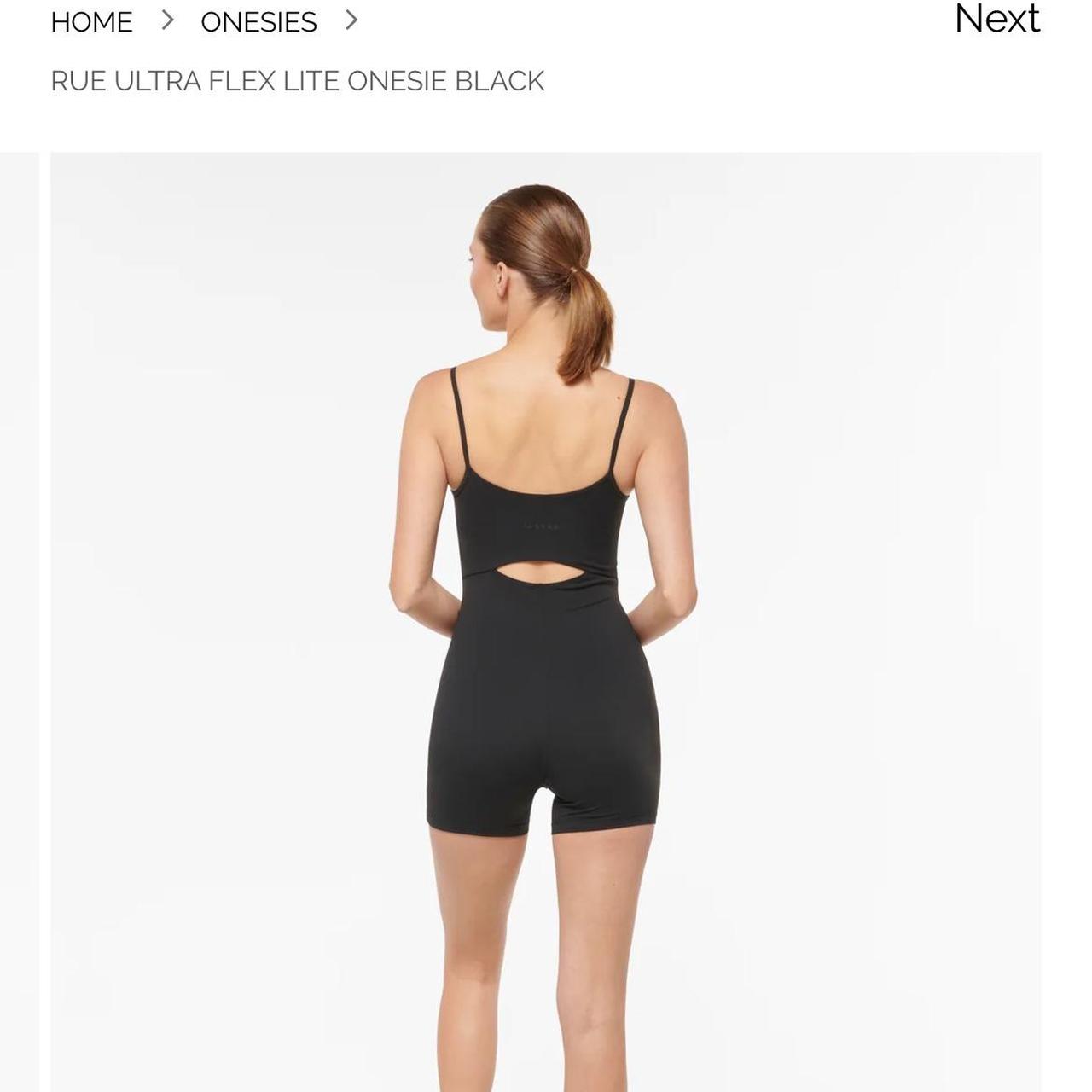 Jaggad black Rue Ultra Flex Lite Onesie (active... | Depop