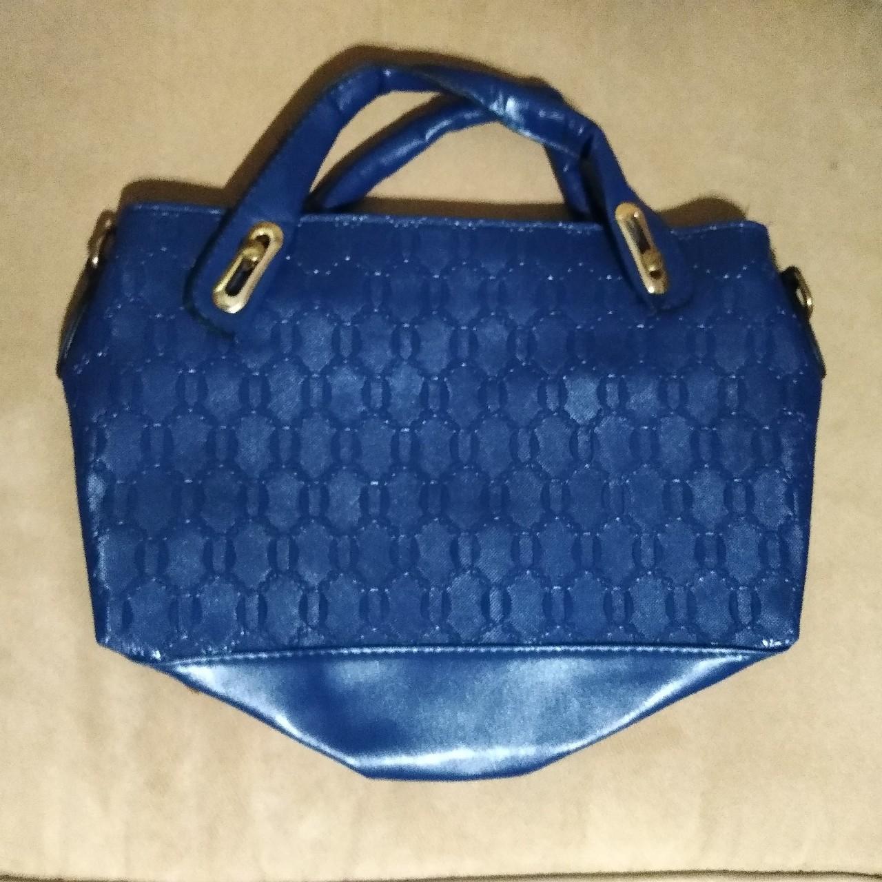 Blue had bag. Nice space inside the bag. The bag has... - Depop