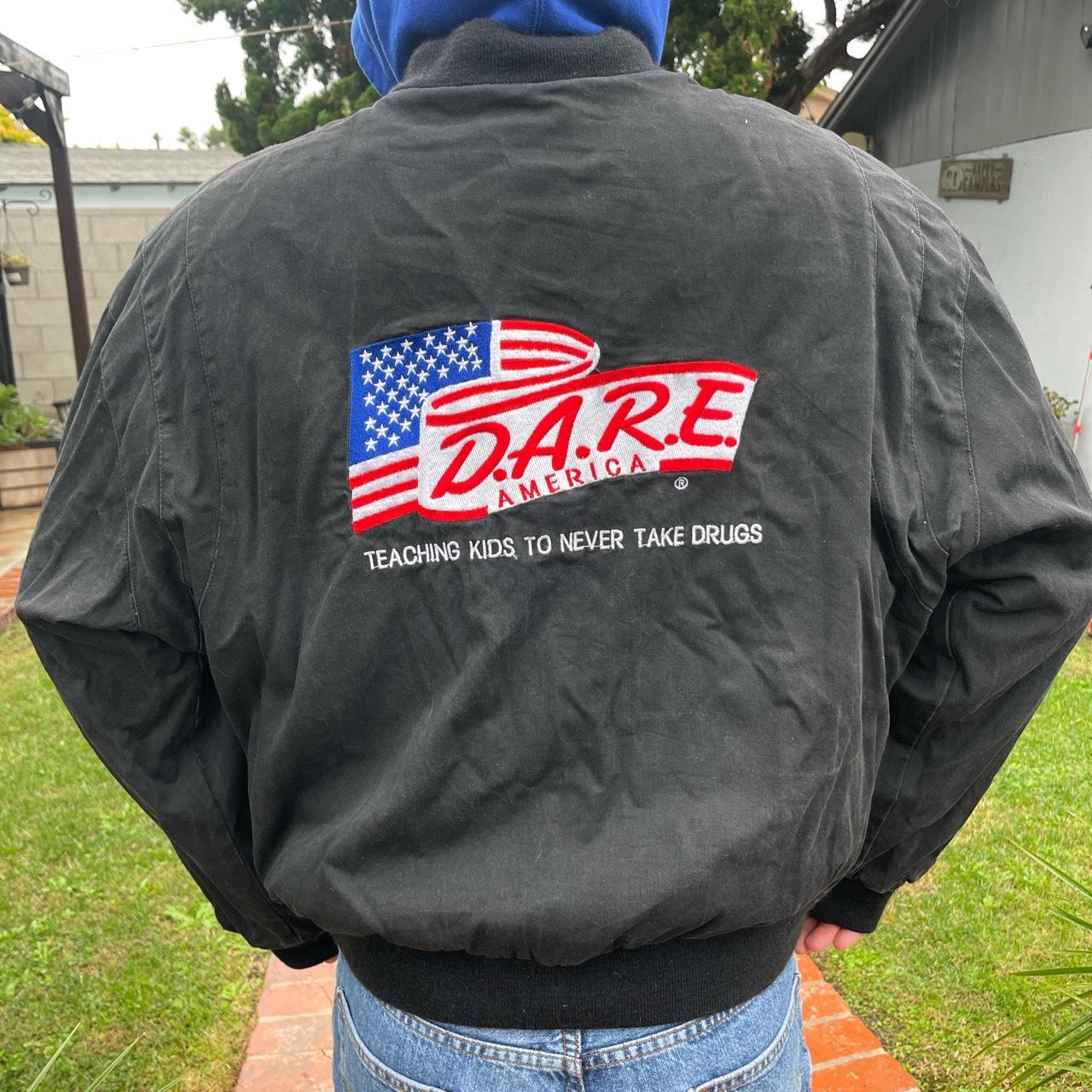 Black bomber jacket with D.A.R.E patch on the... - Depop