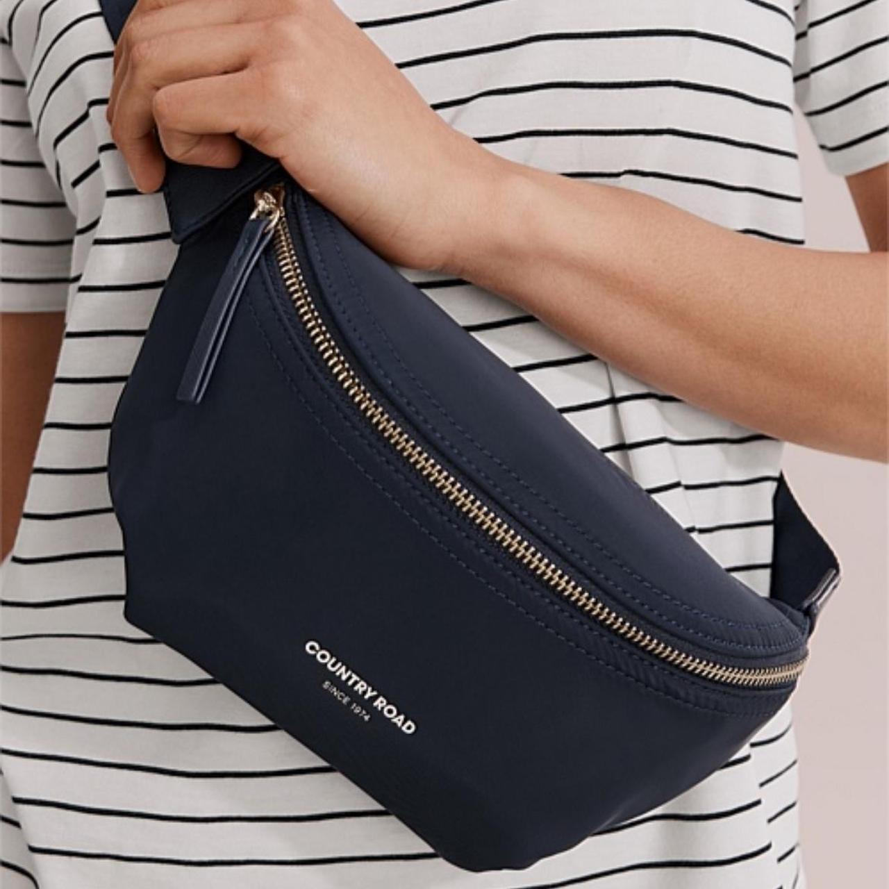 navy blue country road cross body bag, slight mark... - Depop