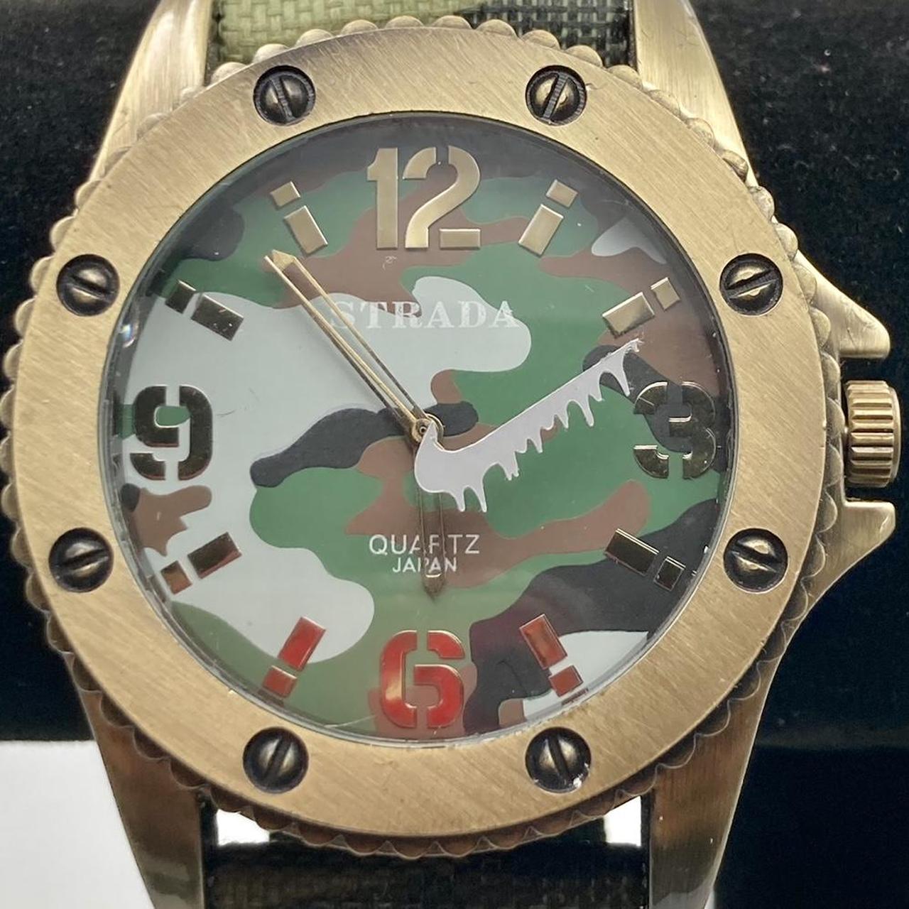 Gold Strada watch with camo wristband. This men’s... - Depop