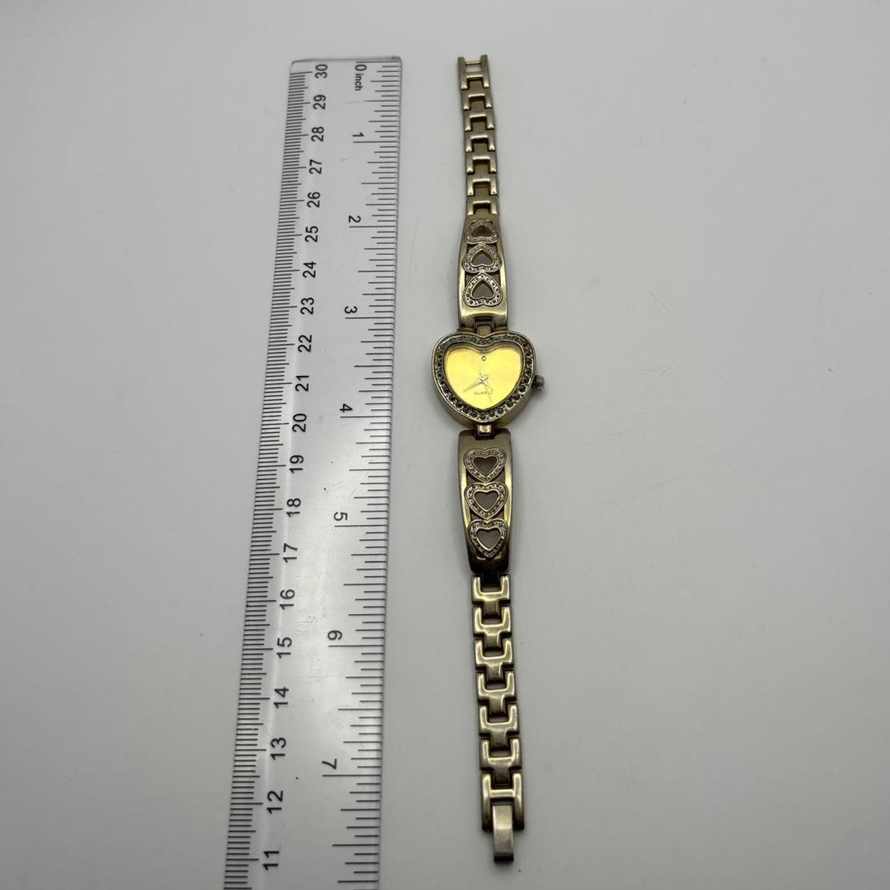 Gold heart watch. Fully functional with brand new... - Depop