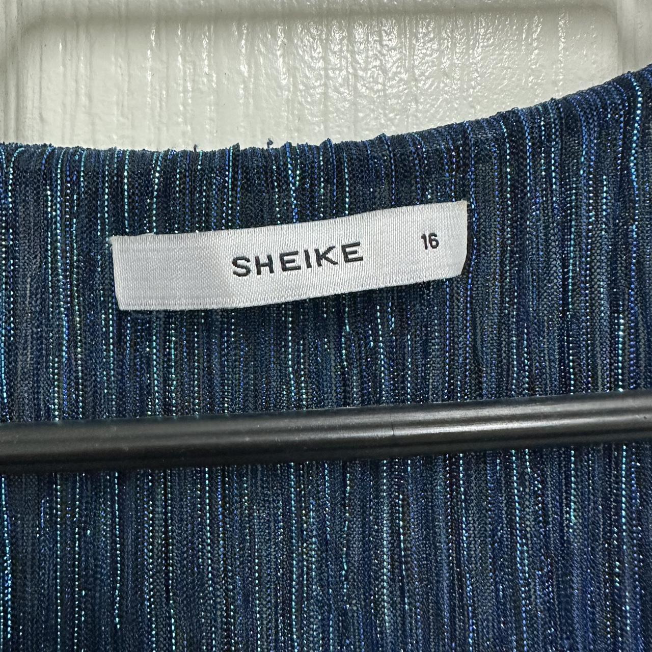 Sheike Atmosphere mini dress Blue metallic long... - Depop