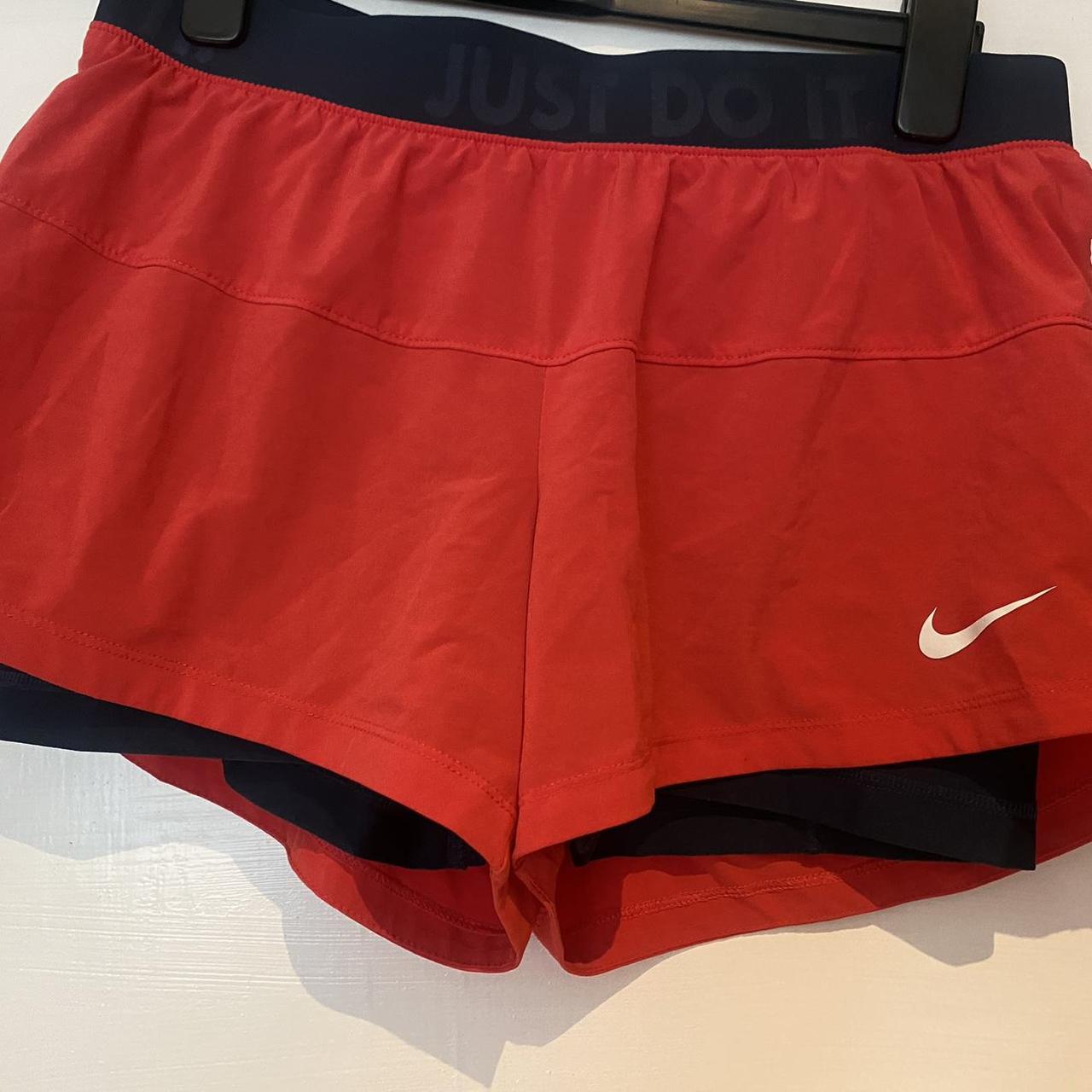 Nike Dri-fit Red shorts w/ navy compression shorts... - Depop