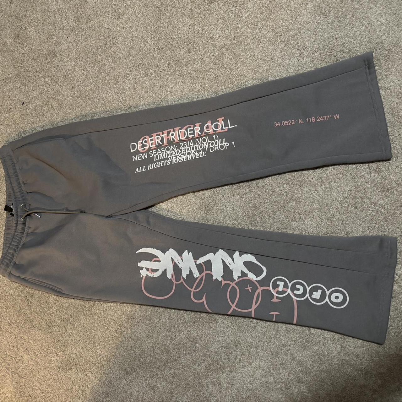 BoohooMAN flared graphic sweatpants. Size large.... - Depop