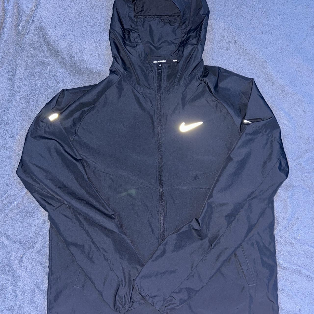 nike rain jacket , barely worn . selling as too small - Depop
