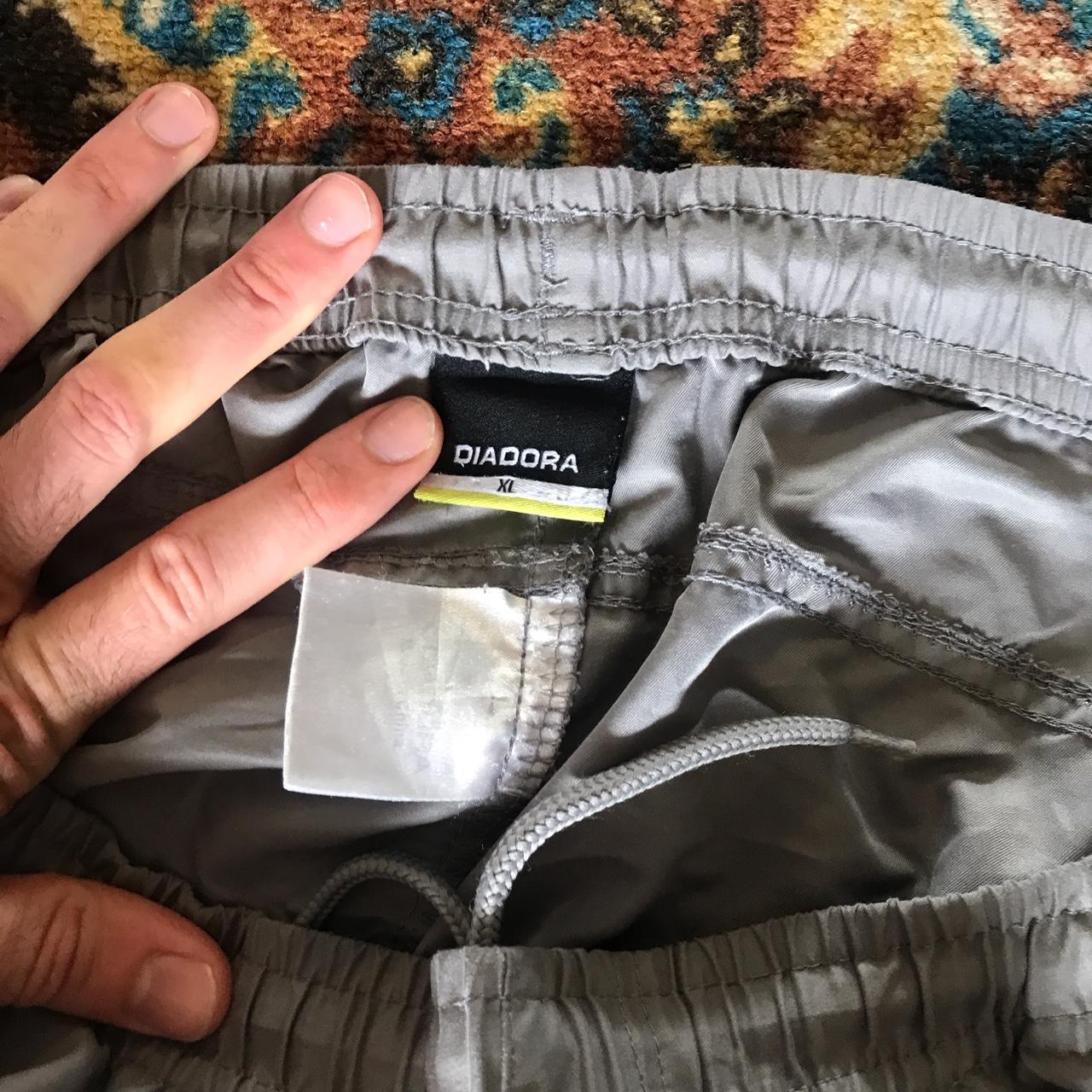 Diadora 3/4 tracksuit pants, light gray and... - Depop