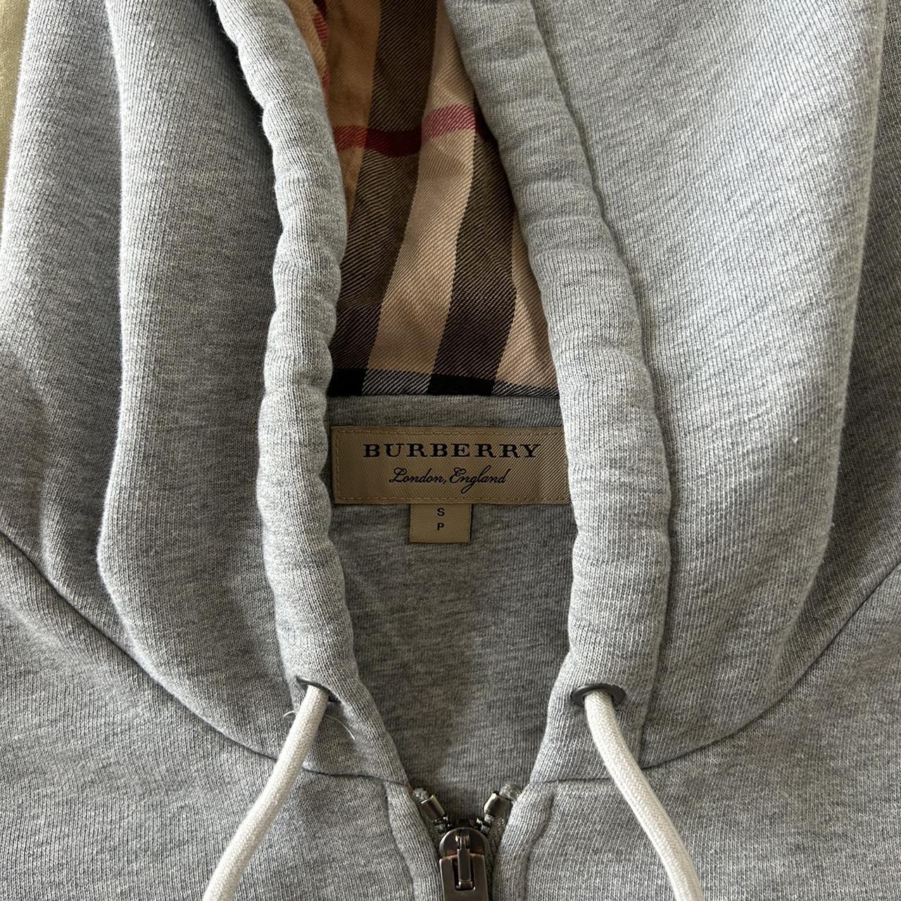 small grey burberry zip up - Depop