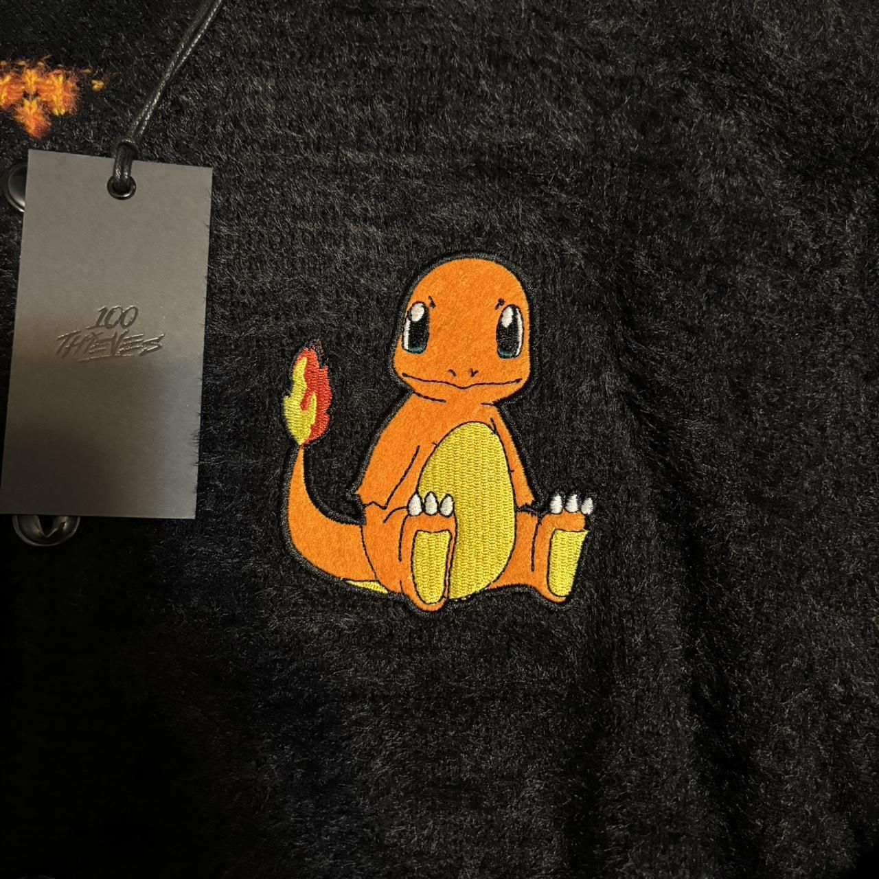 Blackish Grey cardigan with orange Charmander patch... | Depop