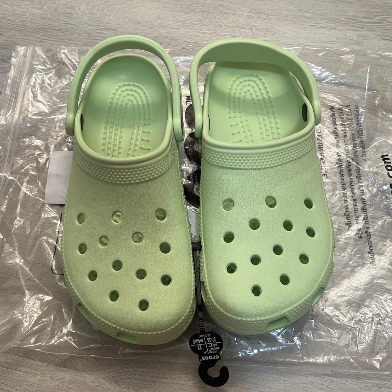 Crocs Women's Green Slides | Depop
