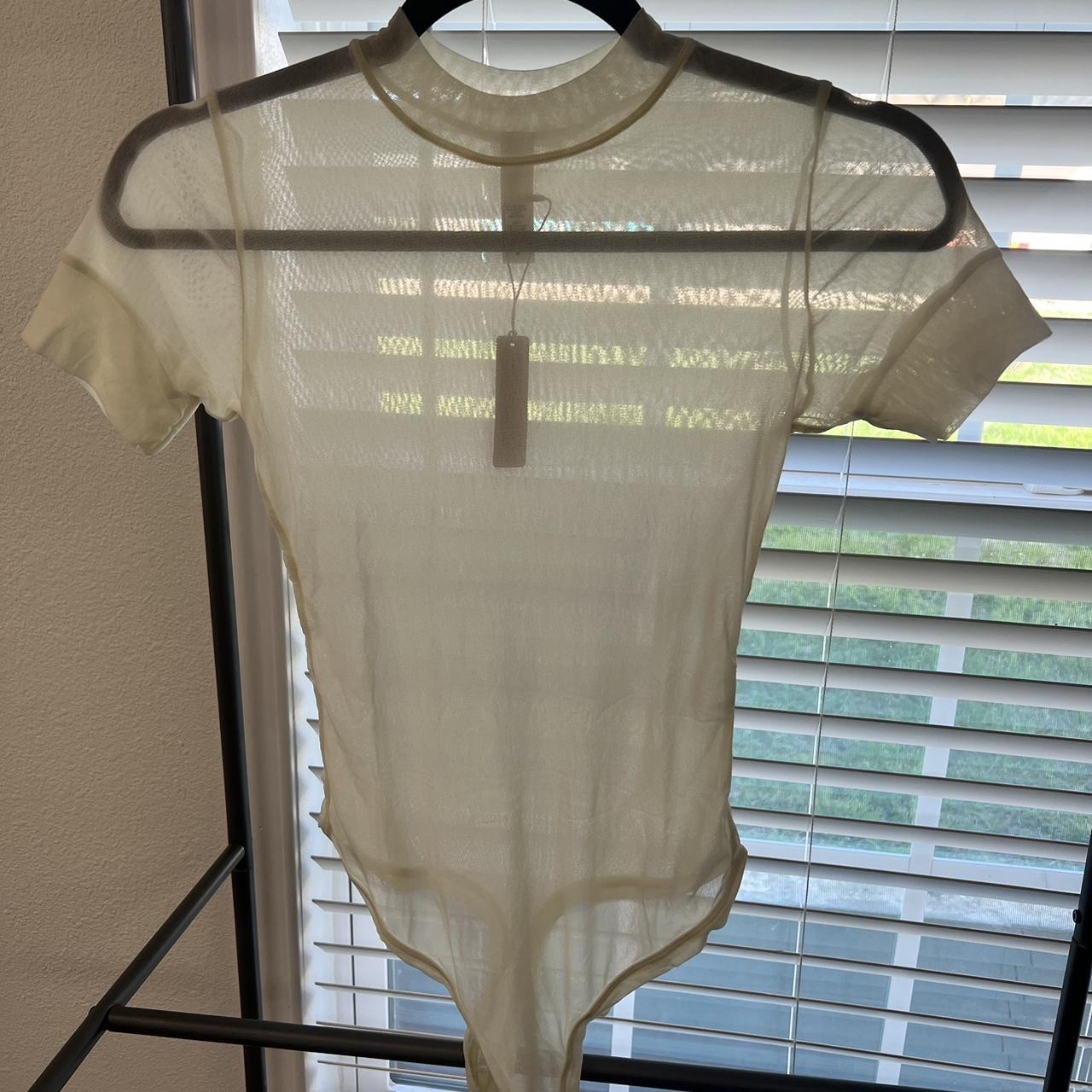 Skims body suit size medium See through Color bone - Depop