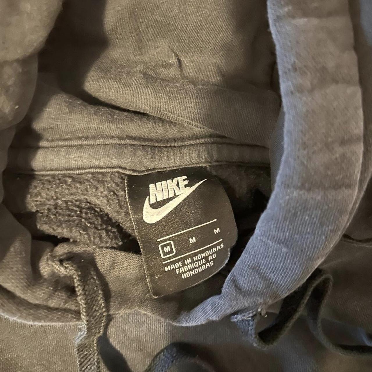 Medium black Nike hoodie - Depop
