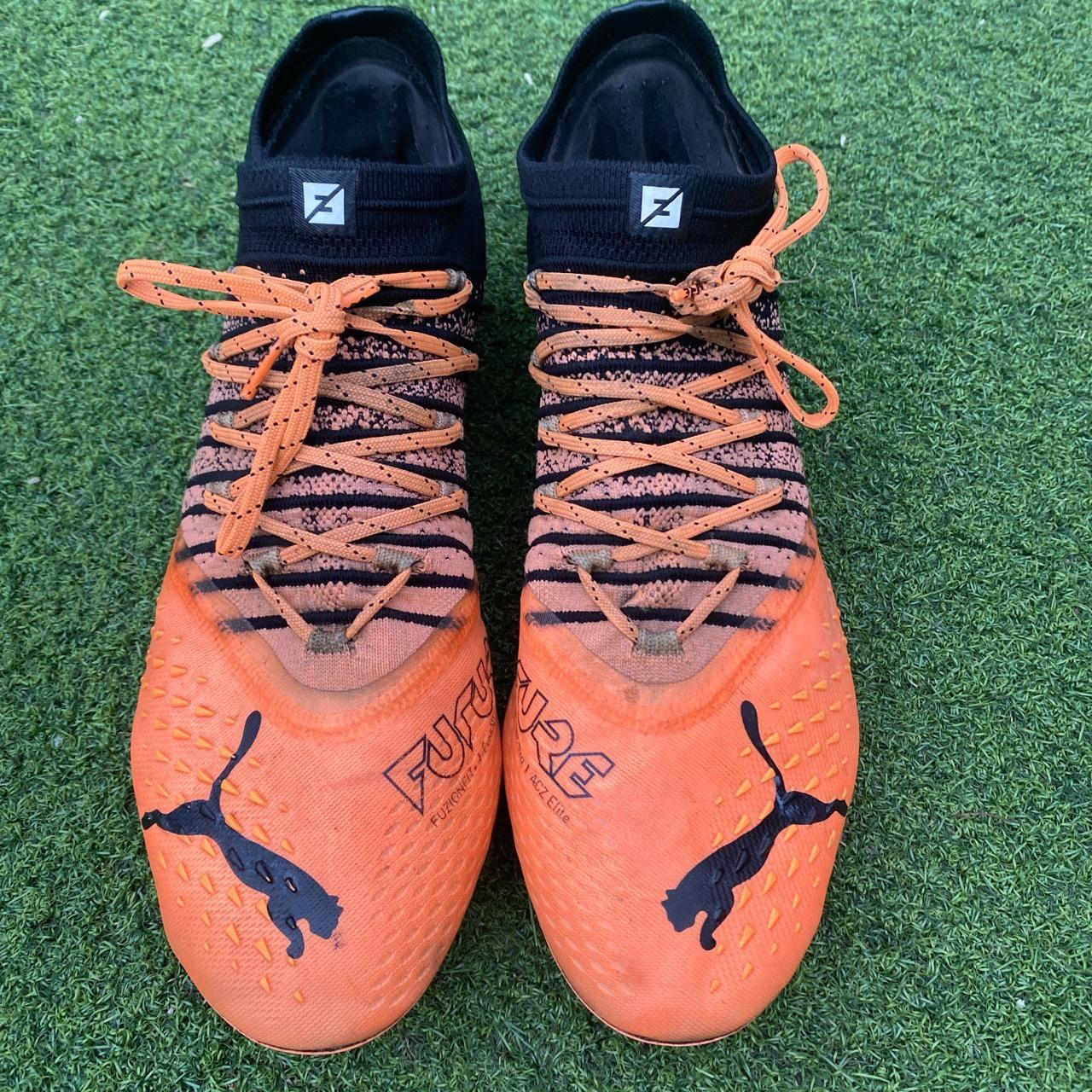 Orange and black puma future z1.1 firm ground... - Depop